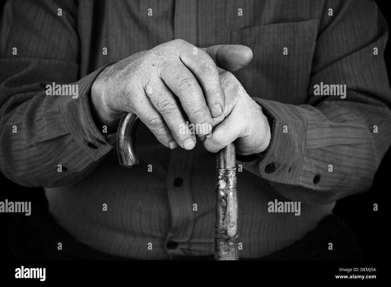 Elderly man holding cane hi-res stock photography and images - Alamy