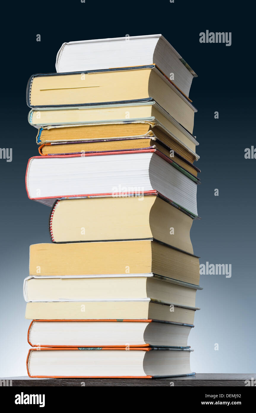 A stack of different books seen from a low point of view Stock Photo ...