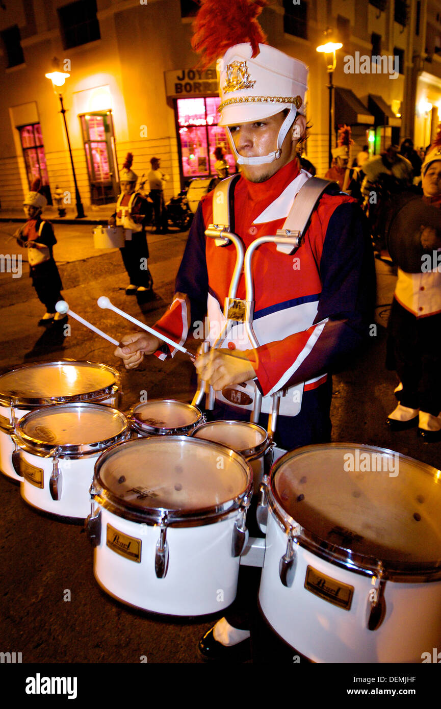 A drummer parades through the streets during the Carnaval de Ponce ...