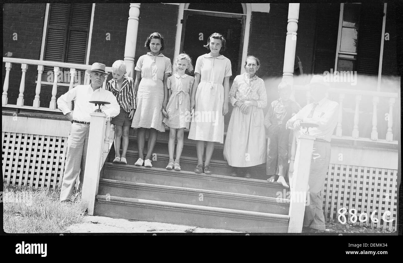 Johnson, John, family on front porch, Mrs. Hall nearly 80 years old ...