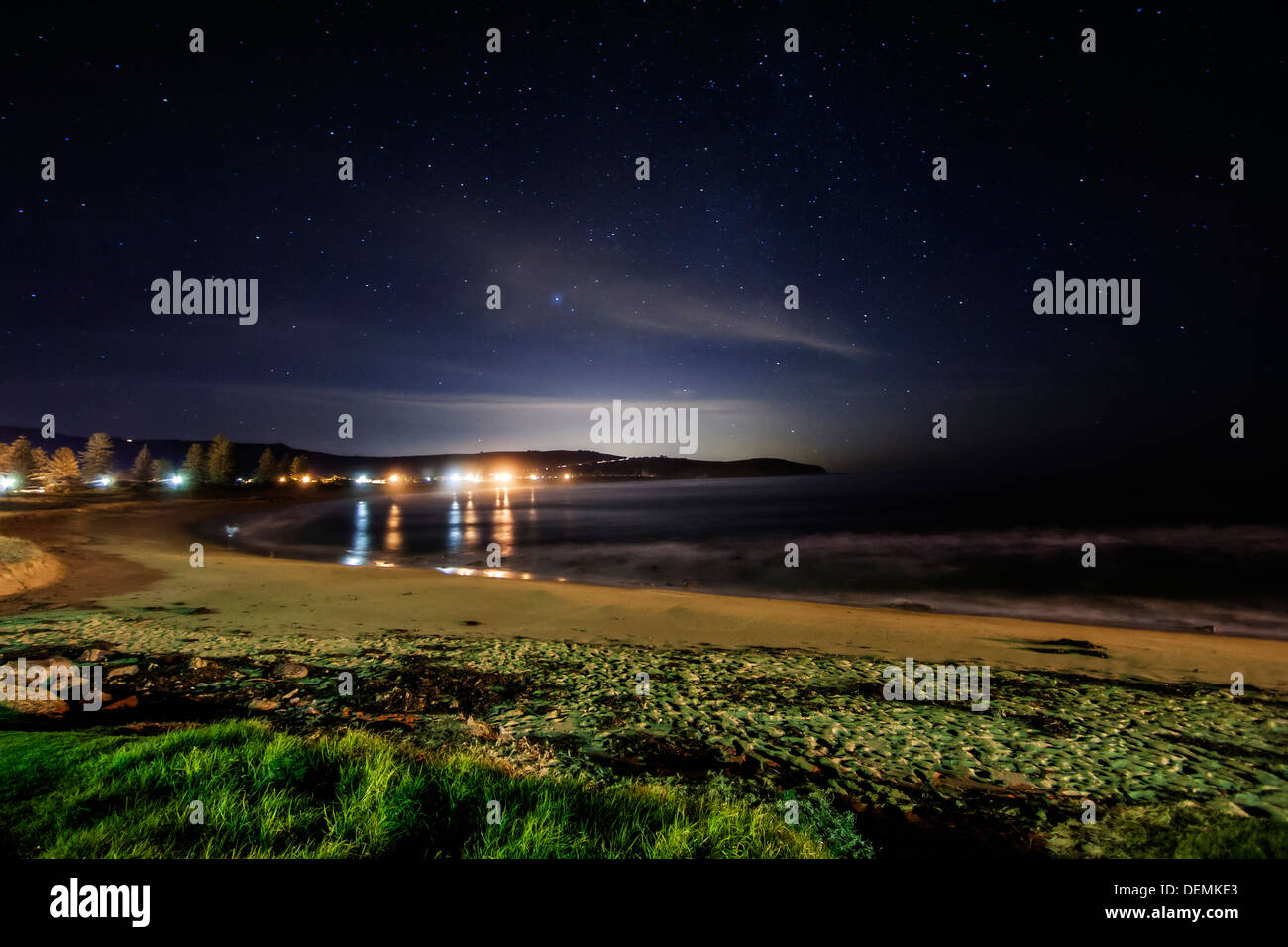 Beach at night with stars in the sky Stock Photo - Alamy