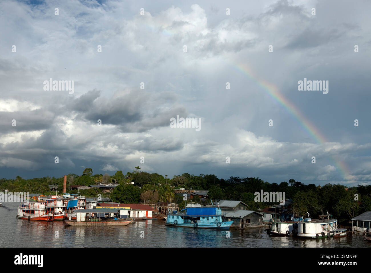 Rainbow appears on the Amazon River after a heavy storm Stock Photo - Alamy
