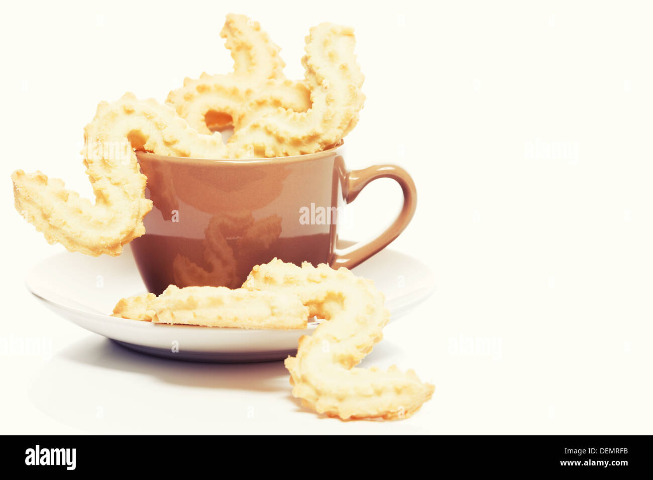 traditional spritz cookies for christmas in and aside a coffee cup ...