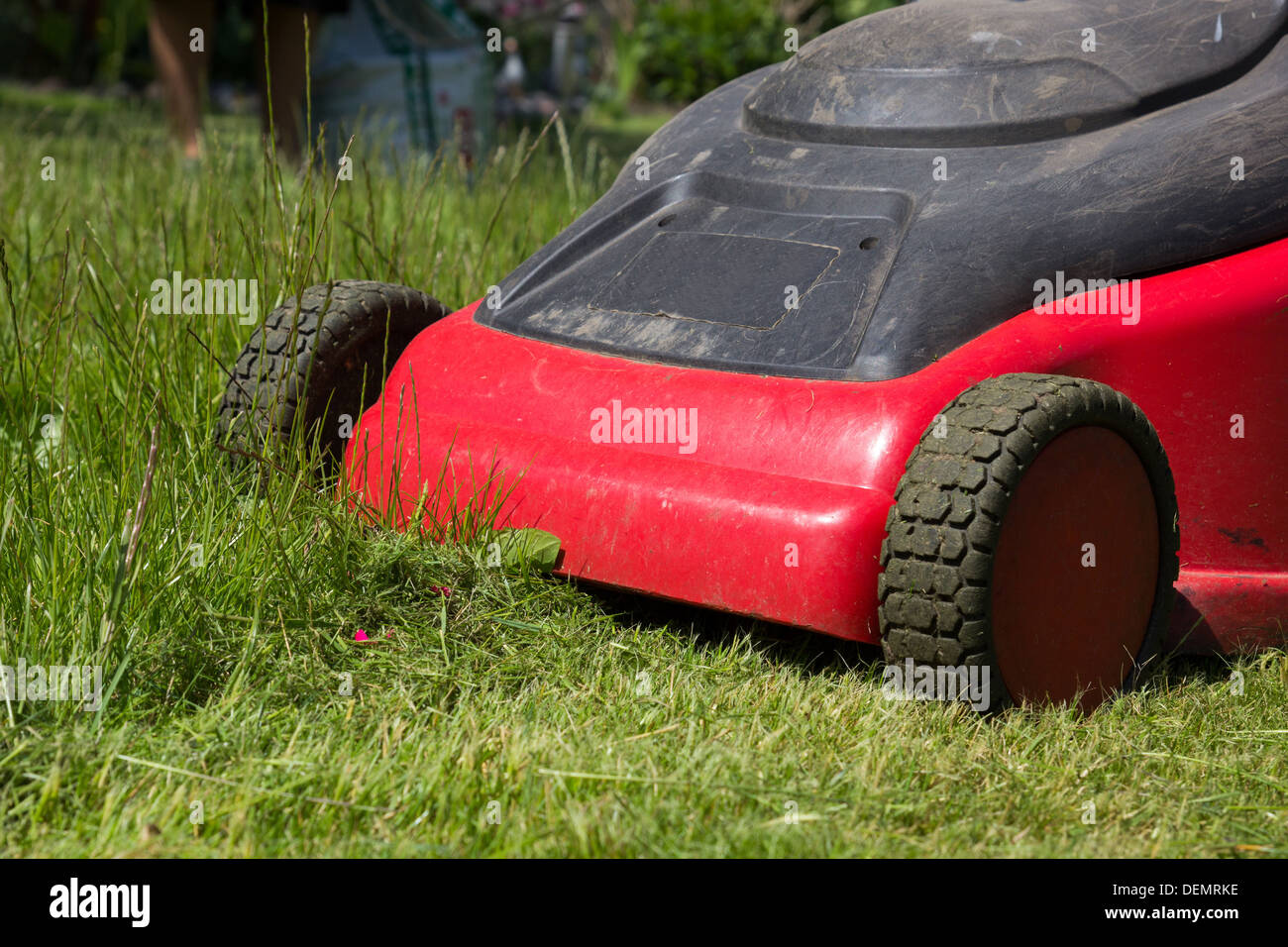 Red lawn mower hi-res stock photography and images - Alamy