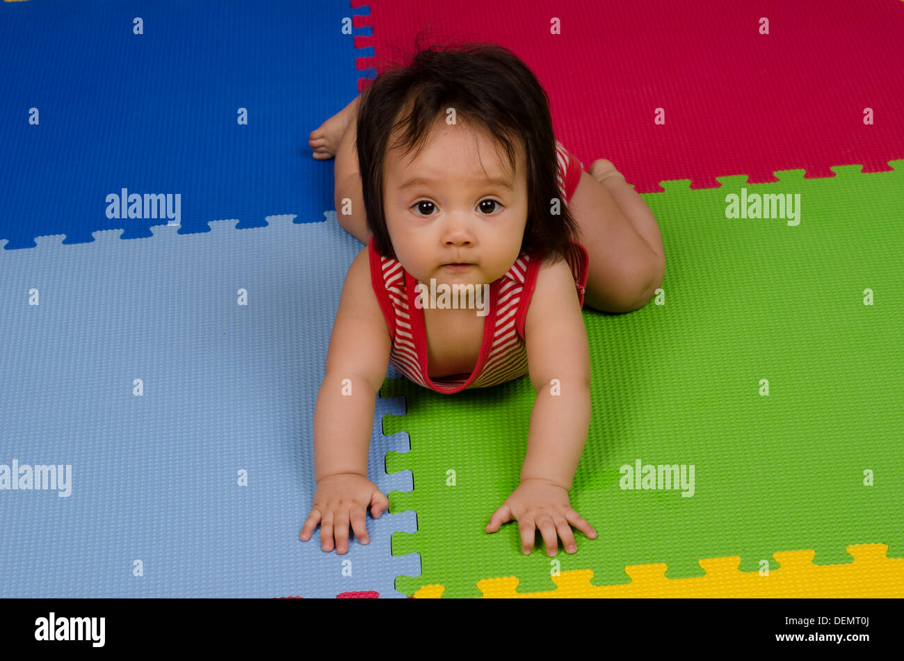 Crawling baby black hi-res stock photography and images - Alamy