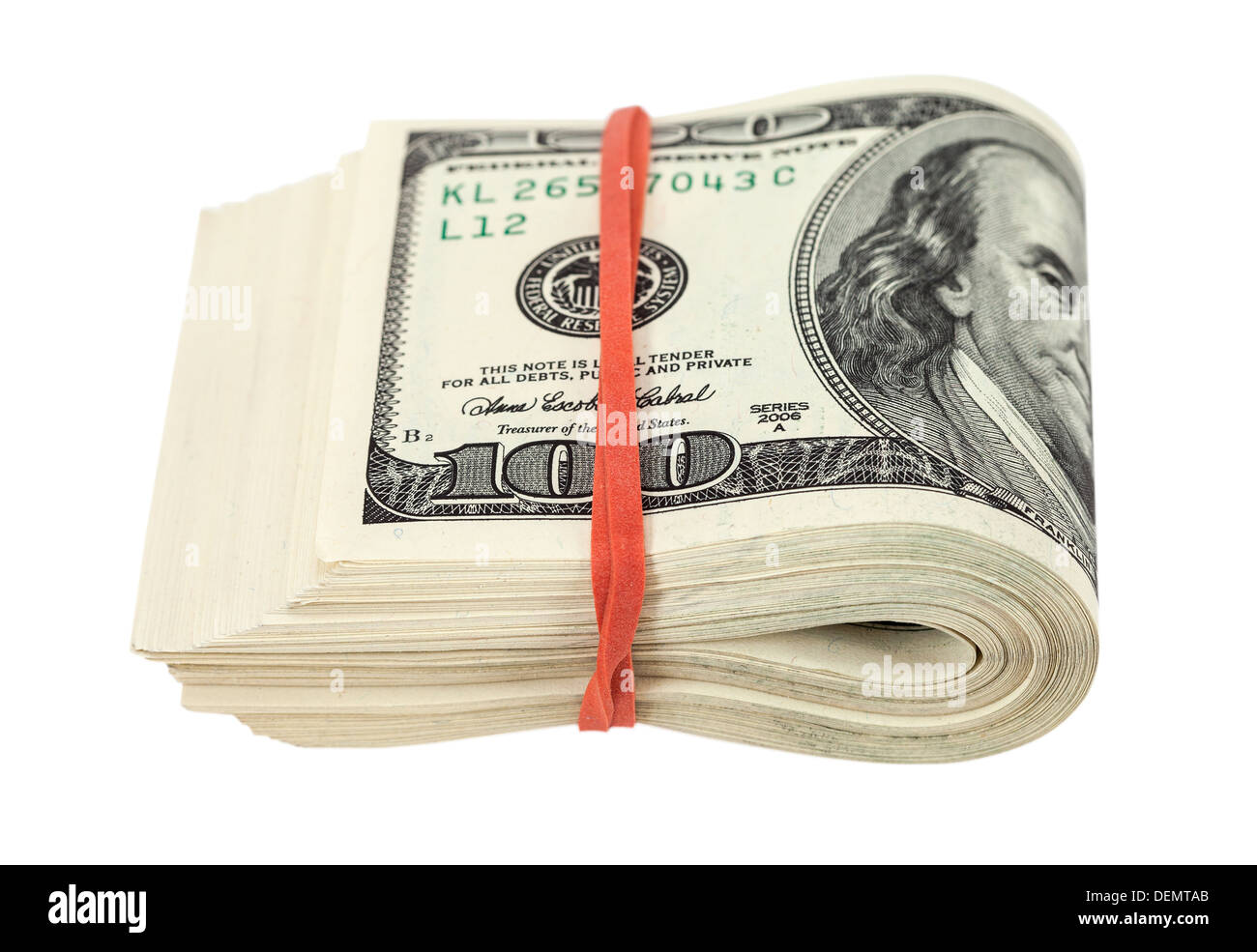 Stack of dollar bills wrapped by rubber on white background Stock Photo ...