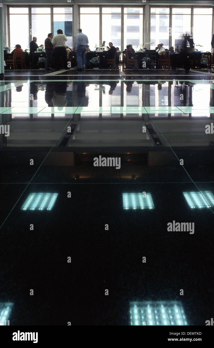 Diamond dealers at the trading floor of the Israel Diamond Exchange ...