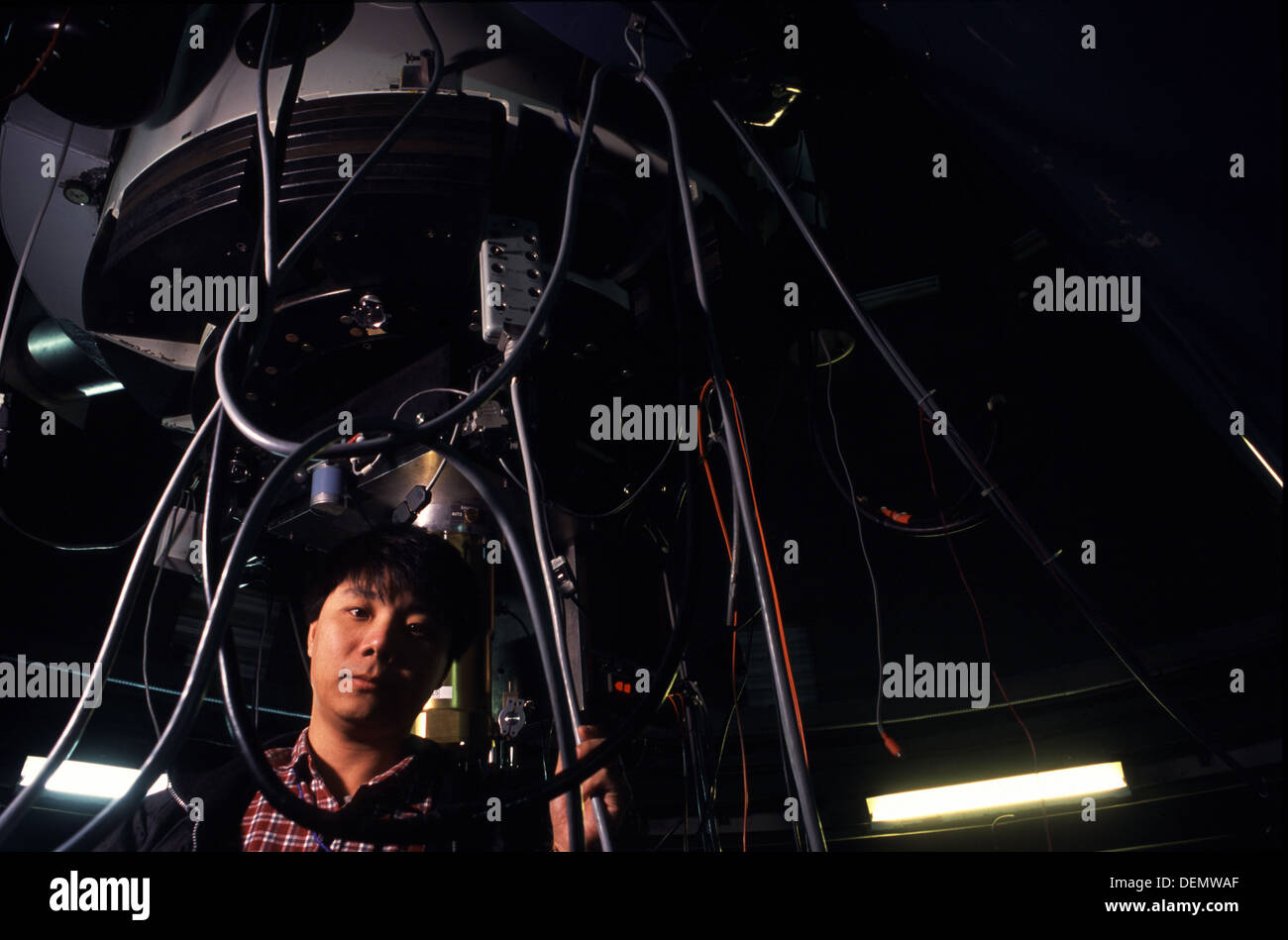 A Chinese technician in a control room of a stars-observatory, located ...
