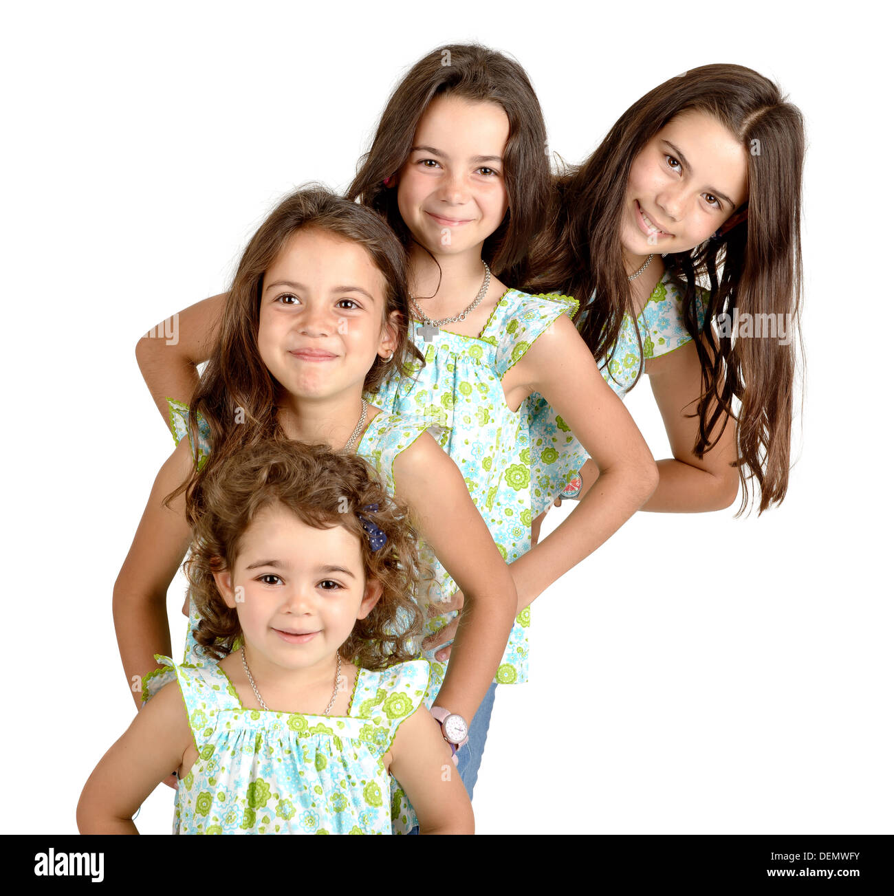 Group of young girls posing isolated Stock Photo - Alamy