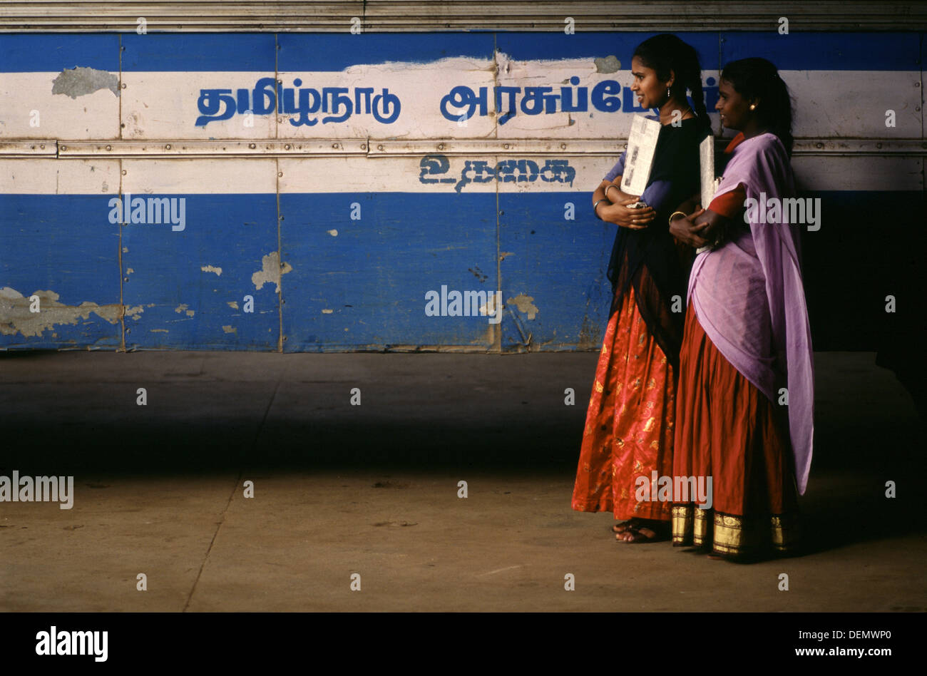 Young women wearing traditional Sari clothing, Tamil Nadu South India ...