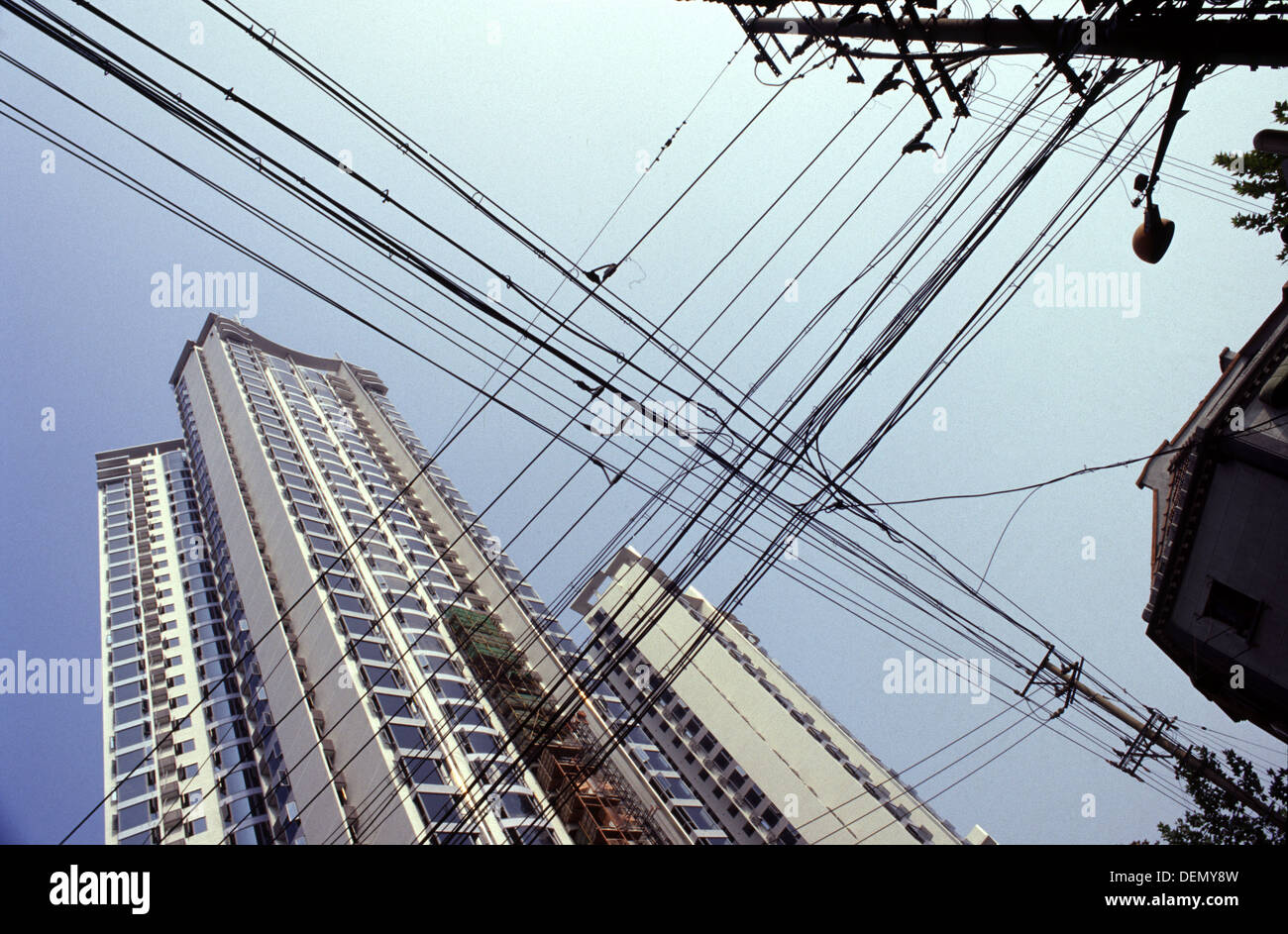 High voltage power transmission lines downtown Shanghai China Stock ...