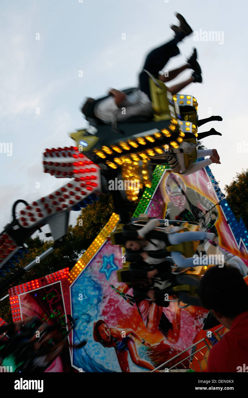 people on fairground ride Stock Photo - Alamy