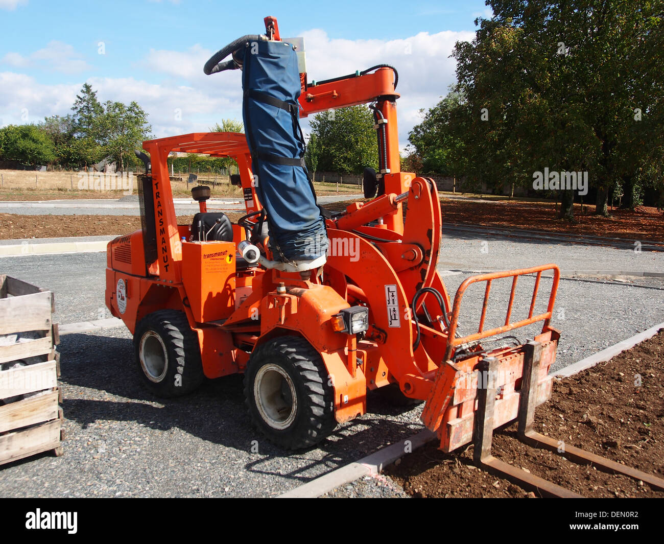 The Transmanut ETP 2004L kerb laying machine is used in construction to ...