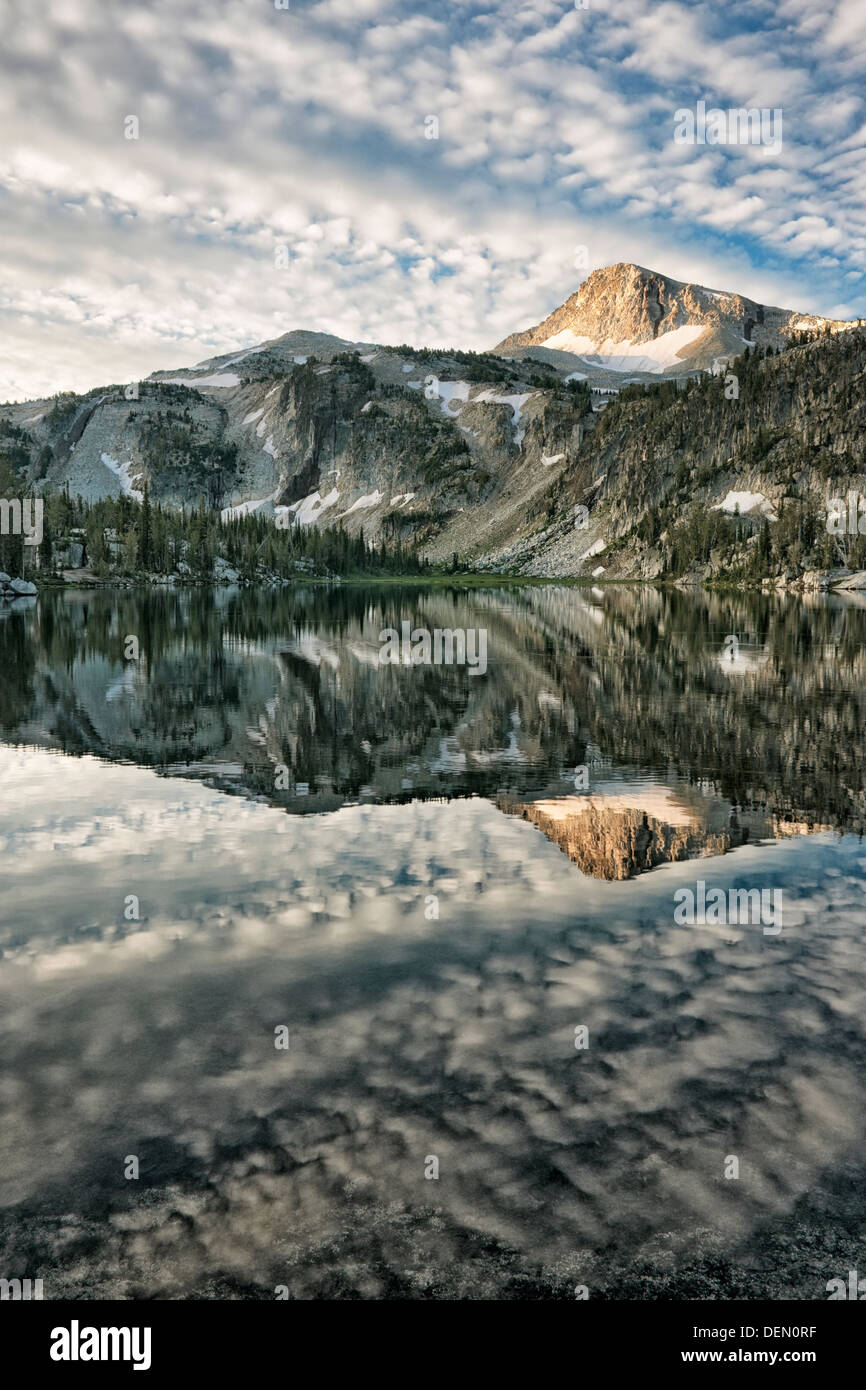 Early light on NE Oregon's Eagle Cap reflecting into Mirror Lake in the ...
