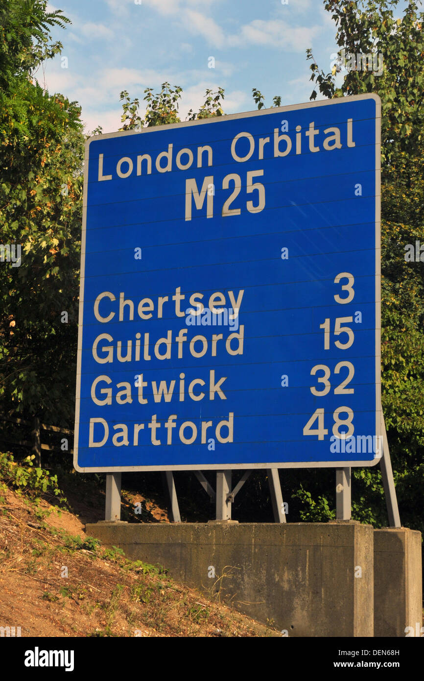 A British road sign directing traffic to towns around the M25 London ...