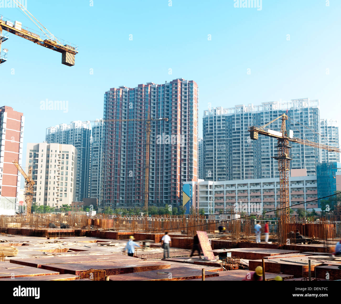 building under construction with workers Stock Photo - Alamy