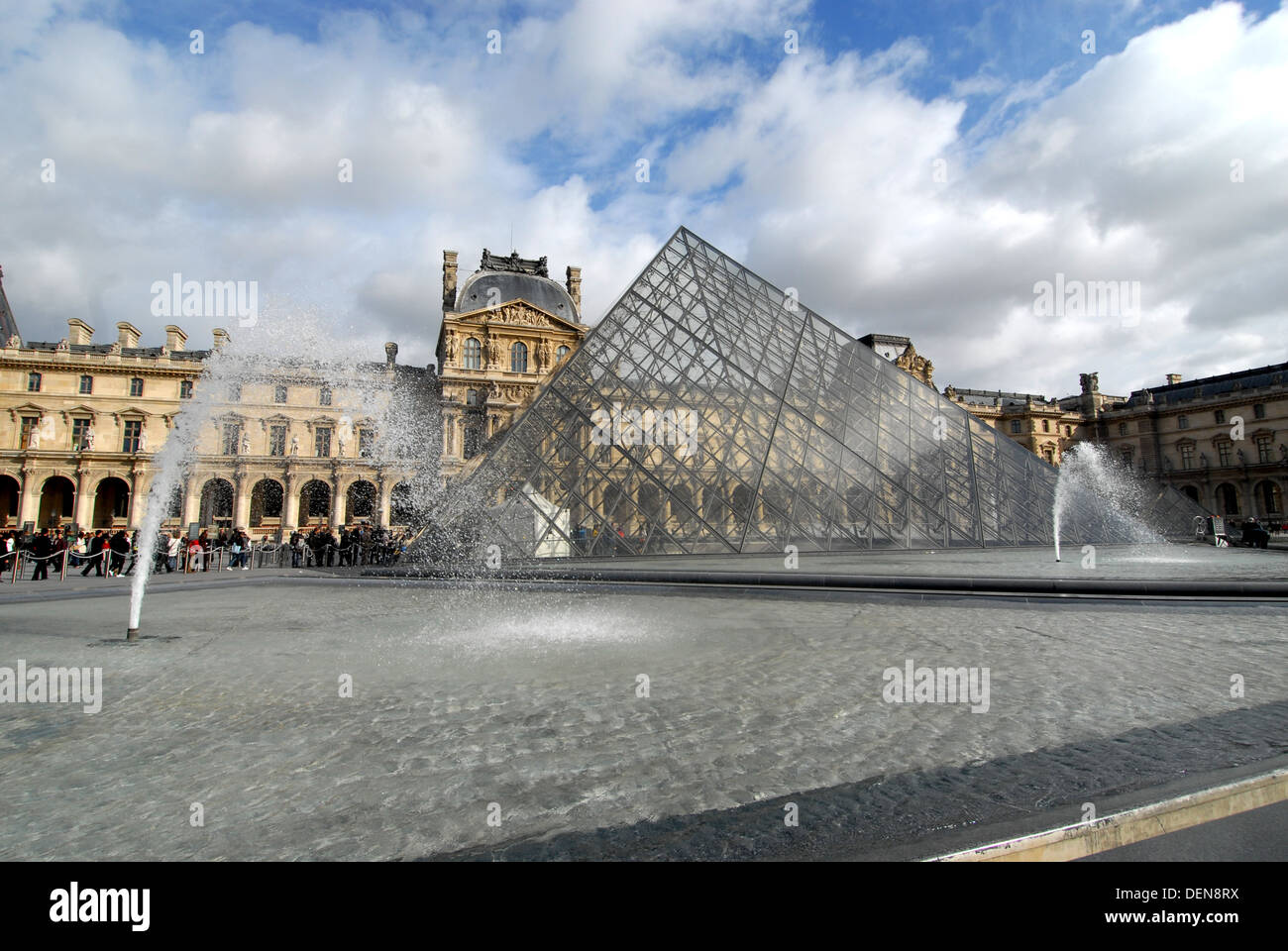 PARIS -the modern glass pyramid of the Louvre contrasts strongly with ...
