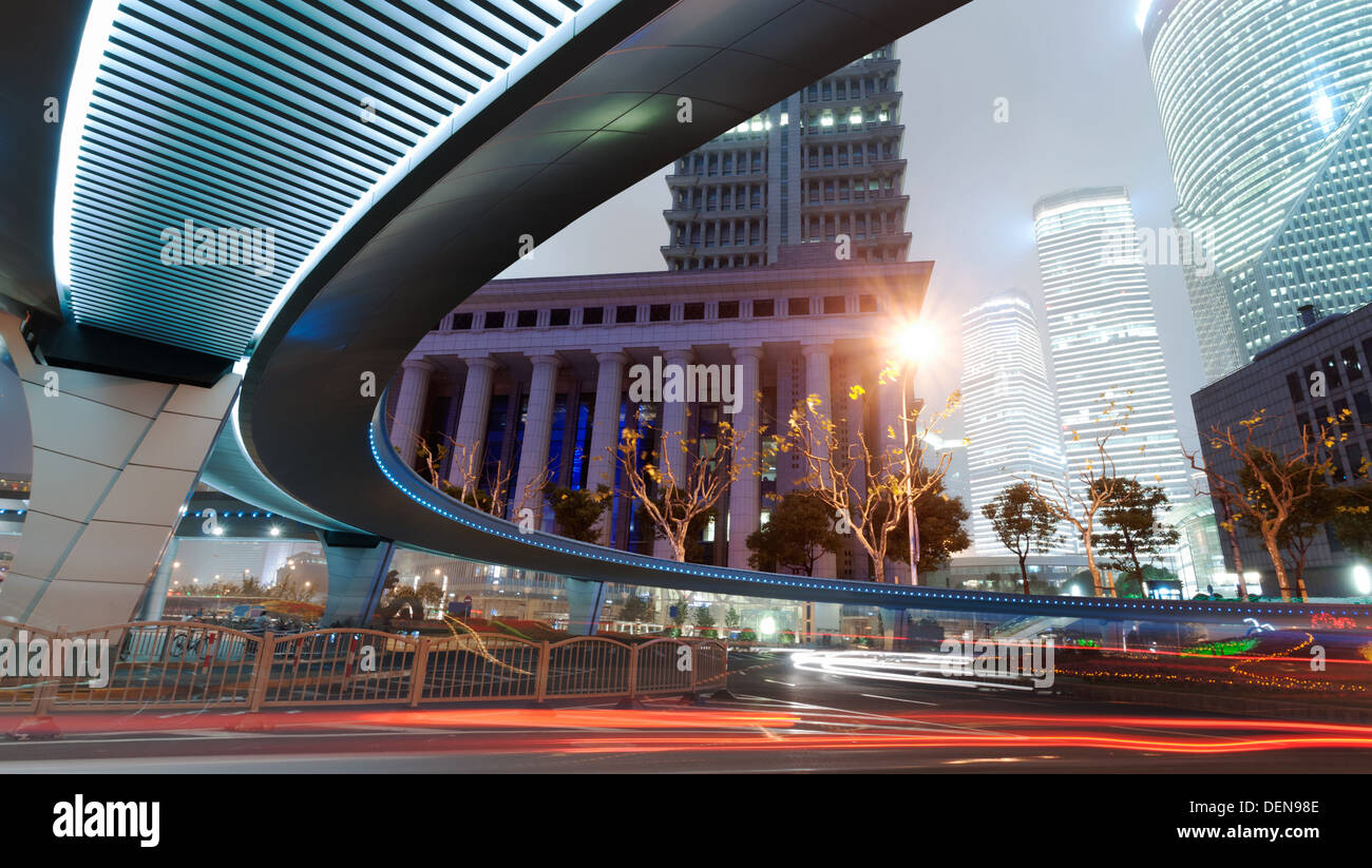 the light trails on the modern building background in shanghai china ...