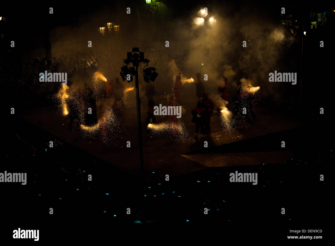 Barcelona, Spain. September 20th, 2013: Fire runners dance in front of ...