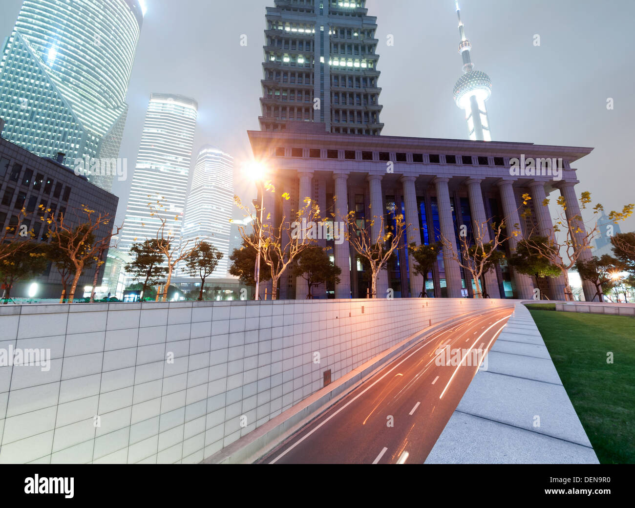 the light trails on the modern building background in shanghai china ...
