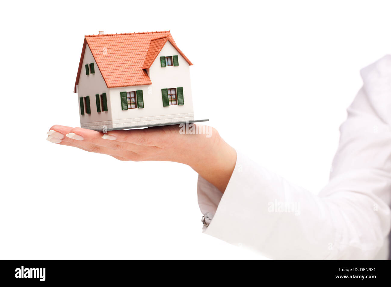 Hand holding house Stock Photo - Alamy