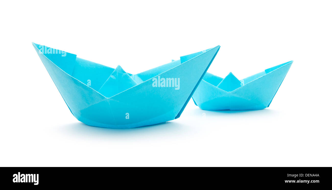 blue paper boats isolated on white background Stock Photo - Alamy