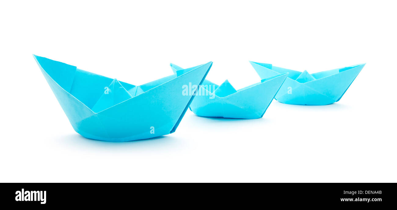 blue paper boats isolated on white background Stock Photo - Alamy