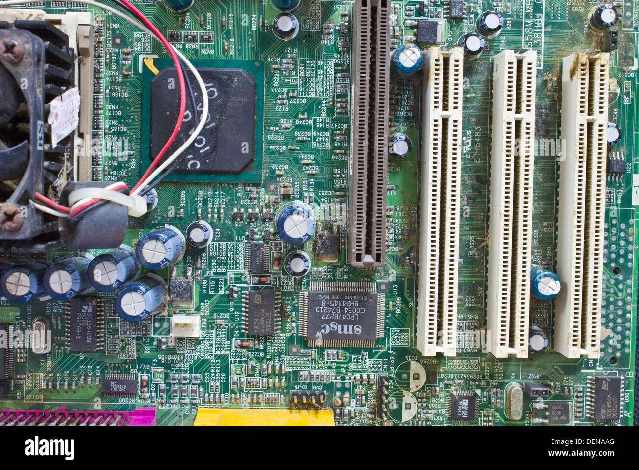 Detail circuit, detail dusty old computer mainboard Stock Photo - Alamy