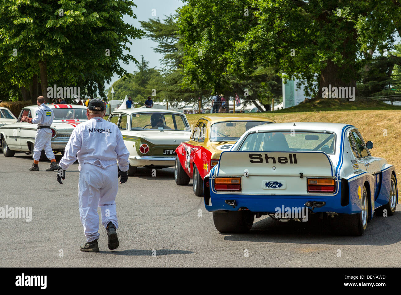 The queue forms at the start for the run up Goodwood hill at the 2013 ...