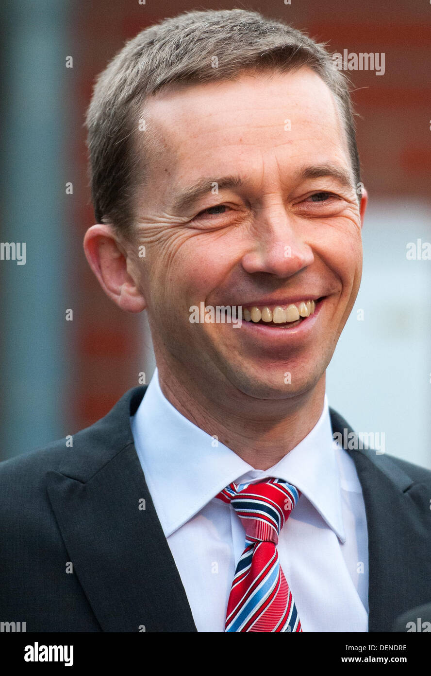 Bernd Lucke, top candidate of the Alternative for Germany (AfD) poses ...