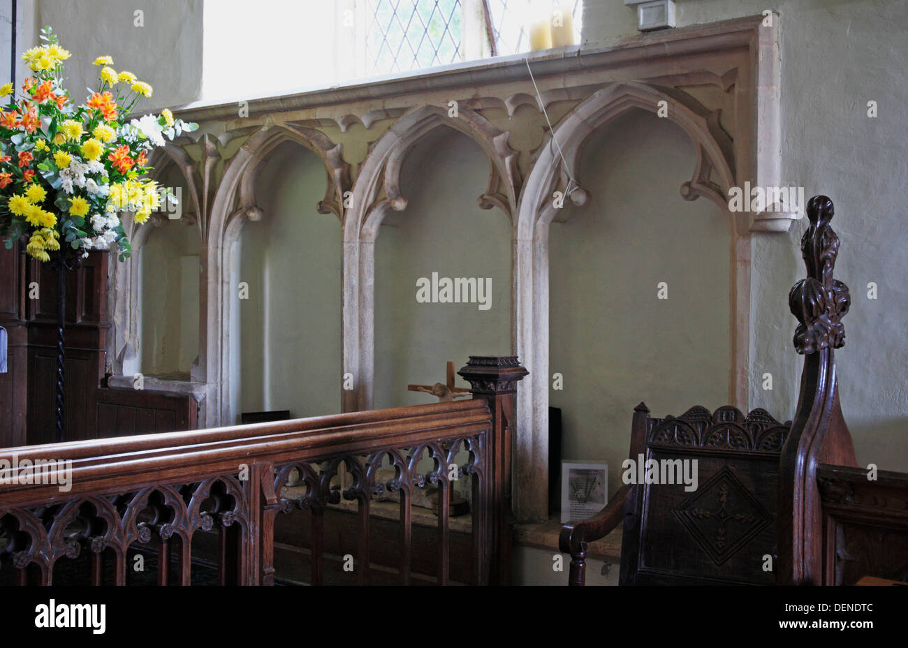 A view of the 14th Century sedilia and piscina in the parish church of ...