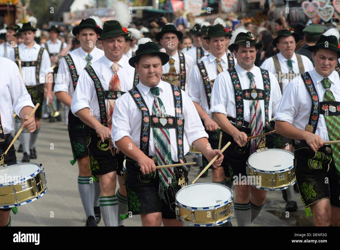 Munich, Germany. 21st Sep, 2013. A marching band parades along the ...