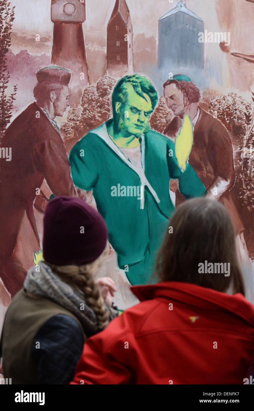 People observe the painring 'Der Landgang' by artist Neo Rauch at ...