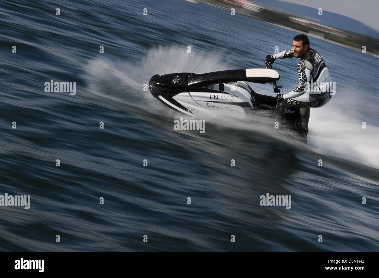 A jet-ski driver performs on Lake Constance on the first day of the ...