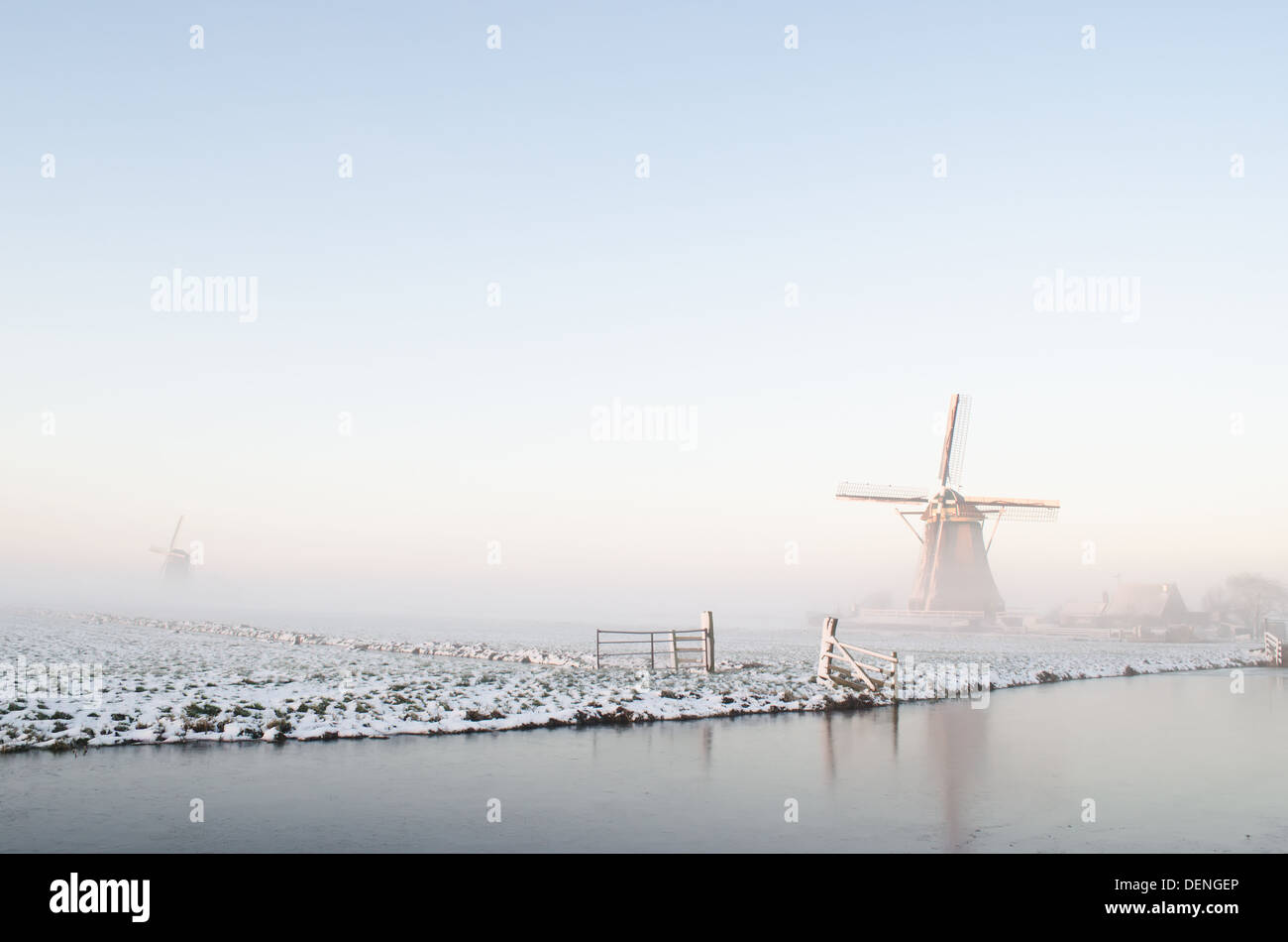 Typical winter landscape in Holland (the Netherlands) with a windmill ...