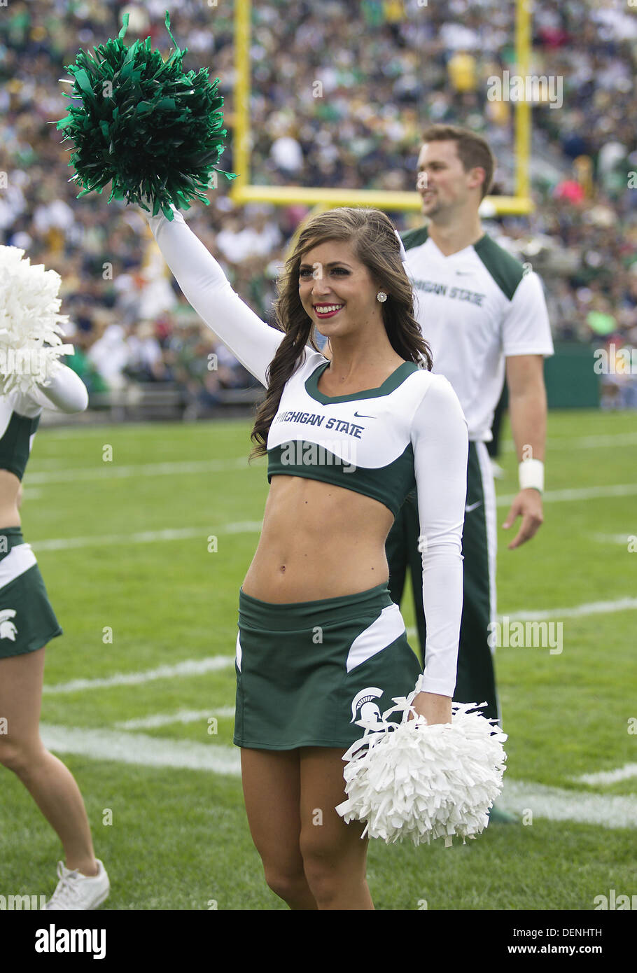 Michigan state cheerleader in action hi-res stock photography and ...