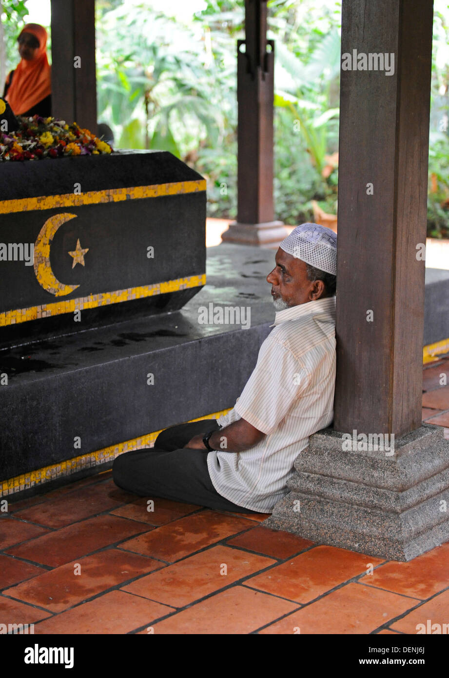 Muslins at the Iskandar Shah, a Muslim shrine in Fort Canning park ...