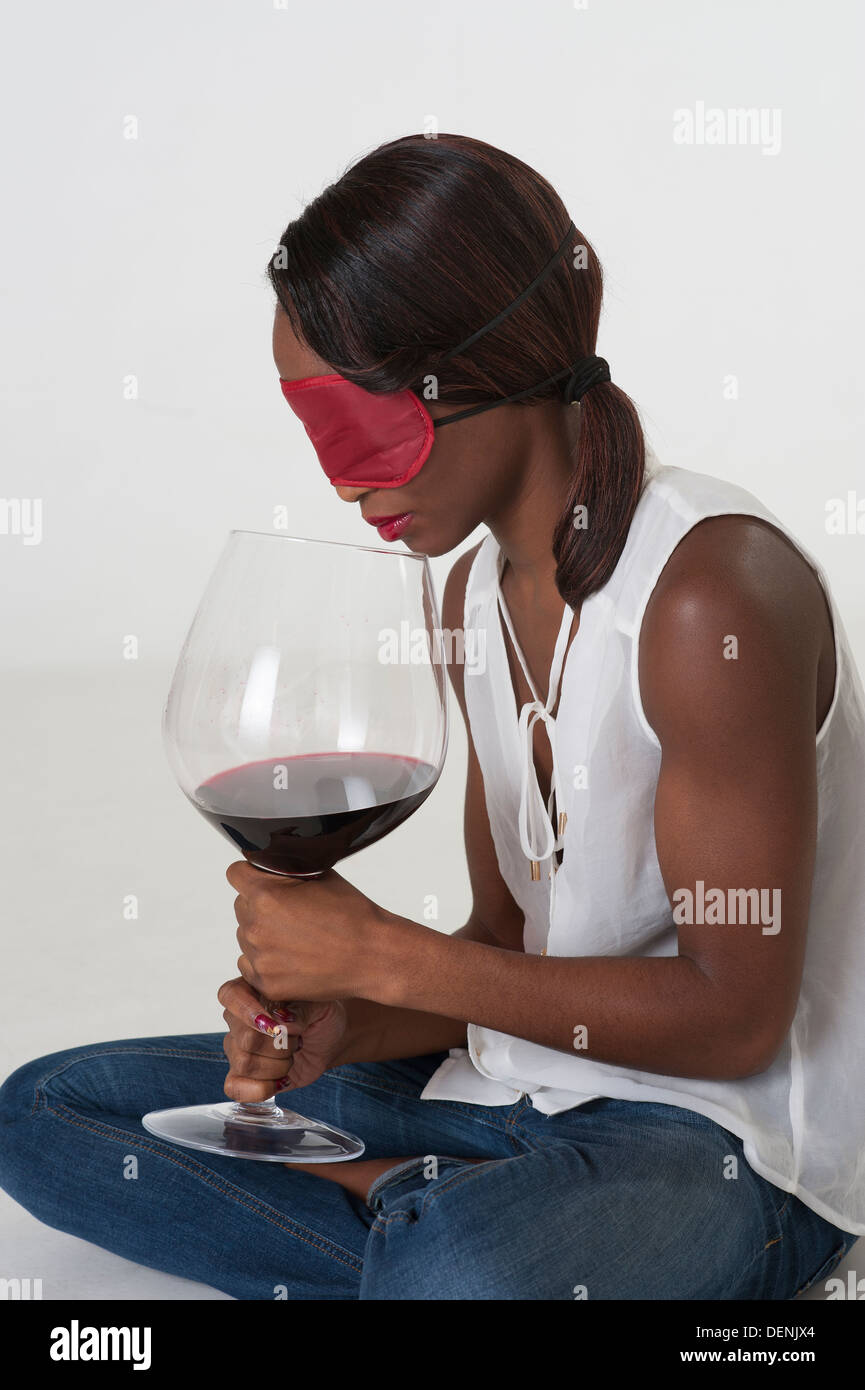 Blind tasting of red wine in a oversize glass Stock Photo - Alamy