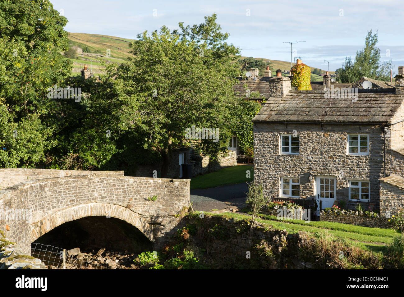 The pretty Swaledale village of Thwaite, Yorkshire Dales National Park ...