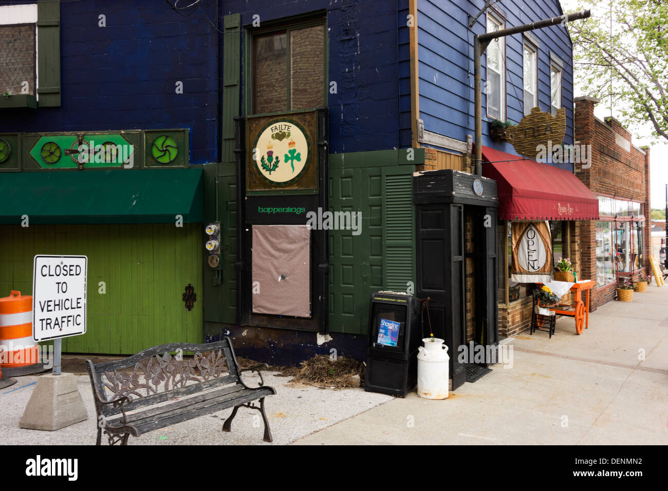 Downtown Montague, Michigan, USA, shops. Alley way traffic sign bars ...