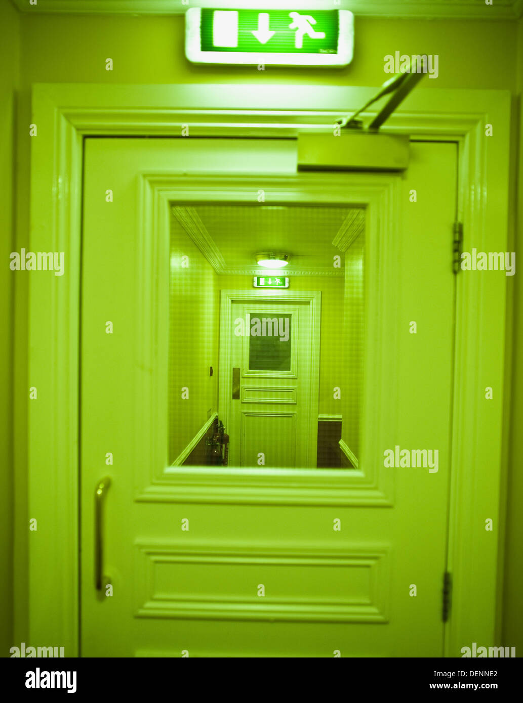 exit sign in a hotel corridor, Dublin Ireland Stock Photo - Alamy