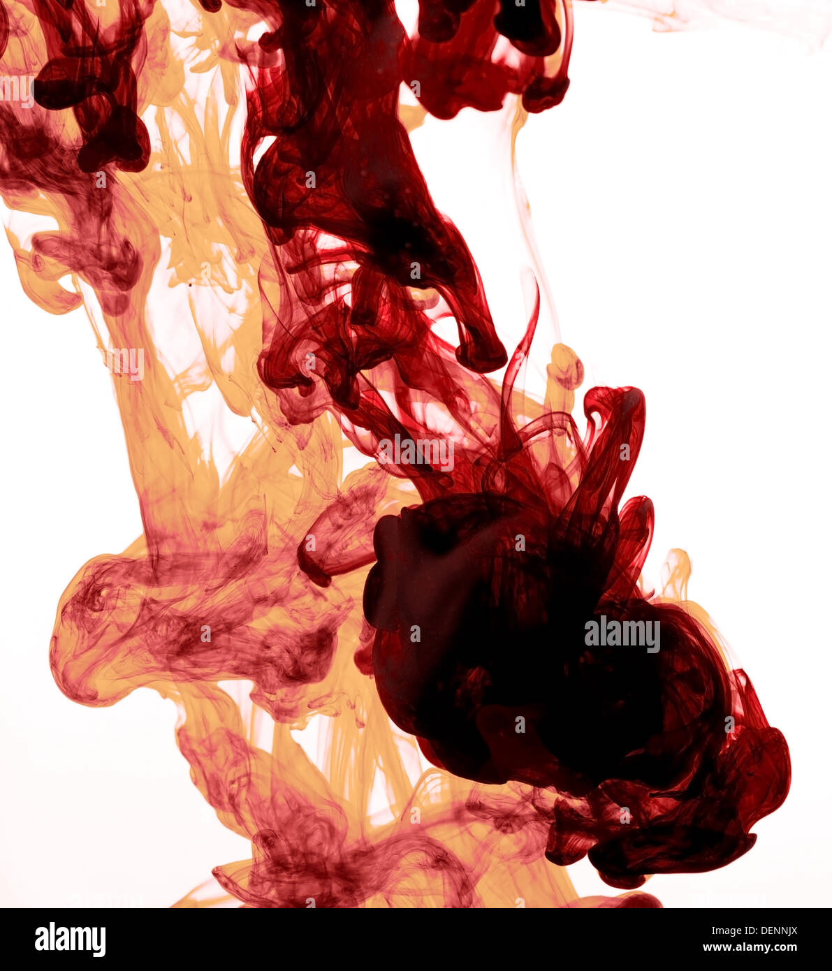 inks in water on white background Stock Photo - Alamy