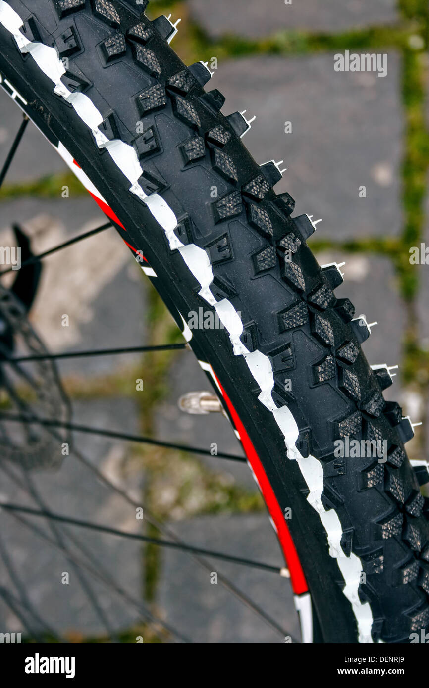Detail of a rubber wheel mountain bike Stock Photo - Alamy
