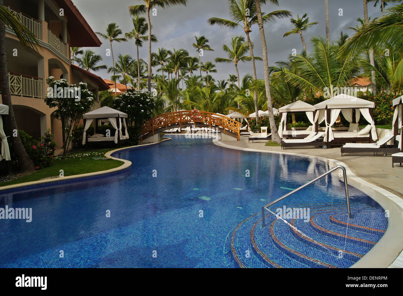 Beach resort pool side Stock Photo - Alamy