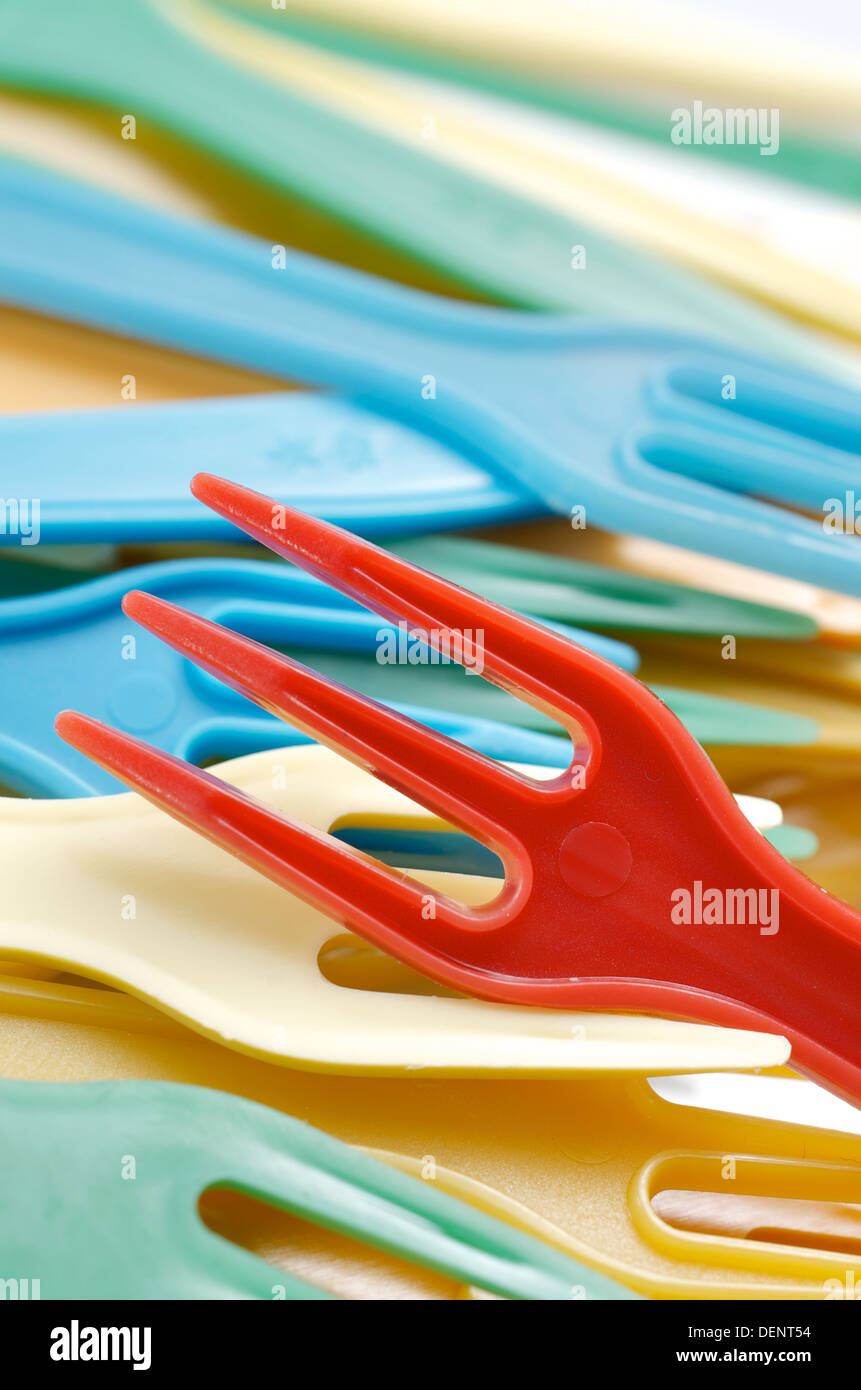 forefront of a group of disposable plastic forks Stock Photo - Alamy