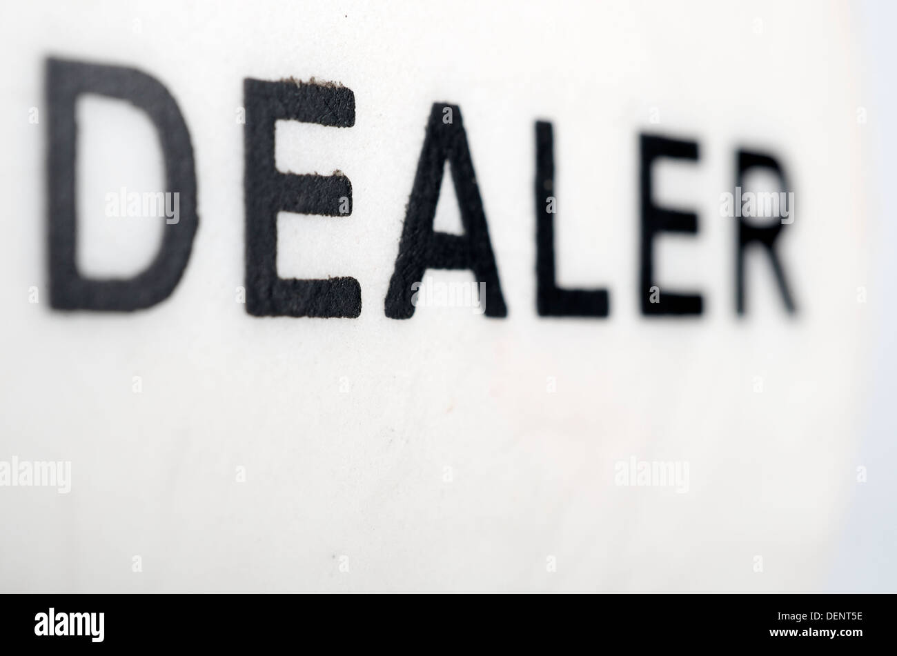 forefront of the word dealer on a white background Stock Photo - Alamy