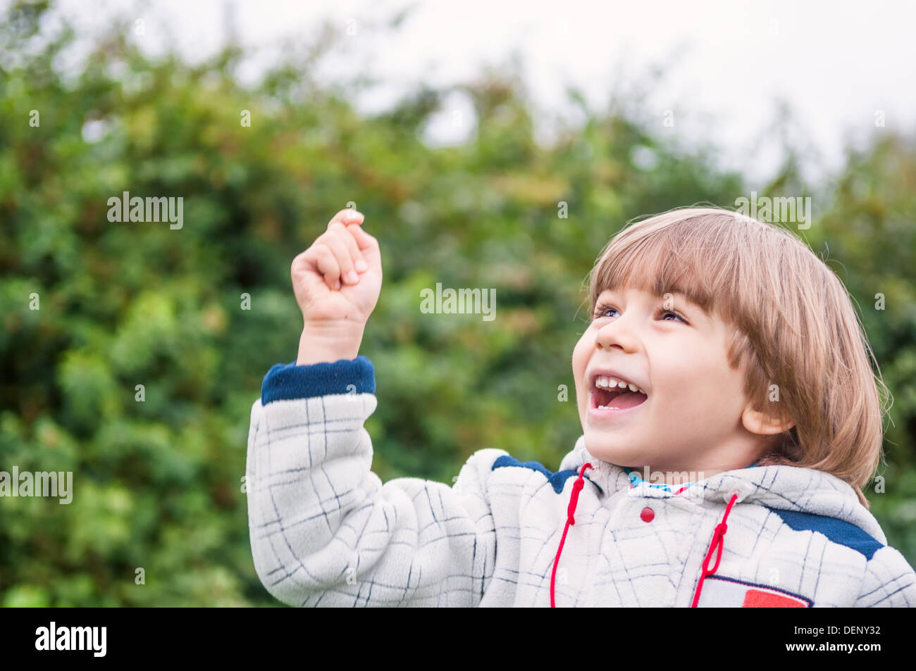 Adorable boy smiling outdoors Stock Photo - Alamy