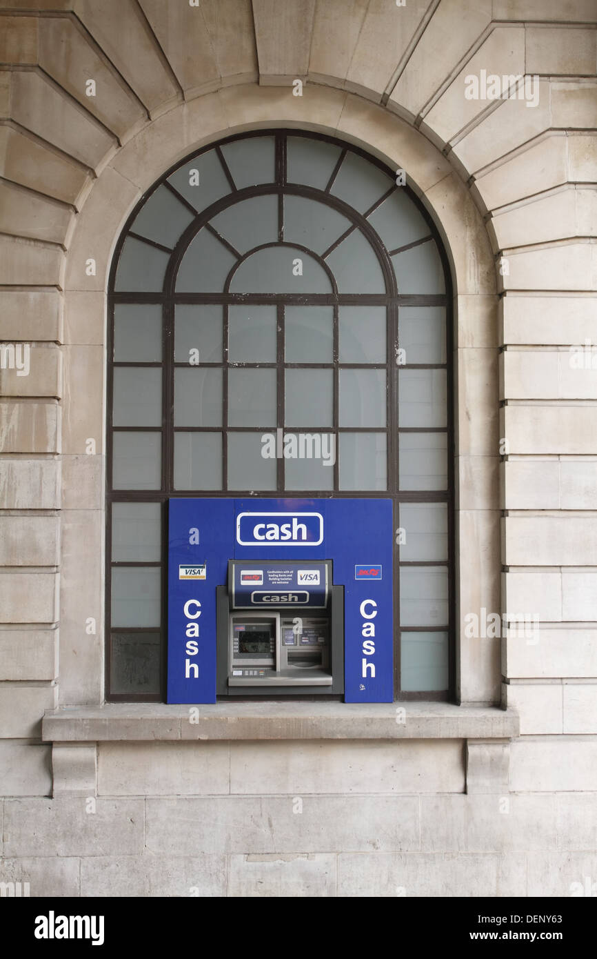 ATM cash machine set in arched window Stock Photo - Alamy