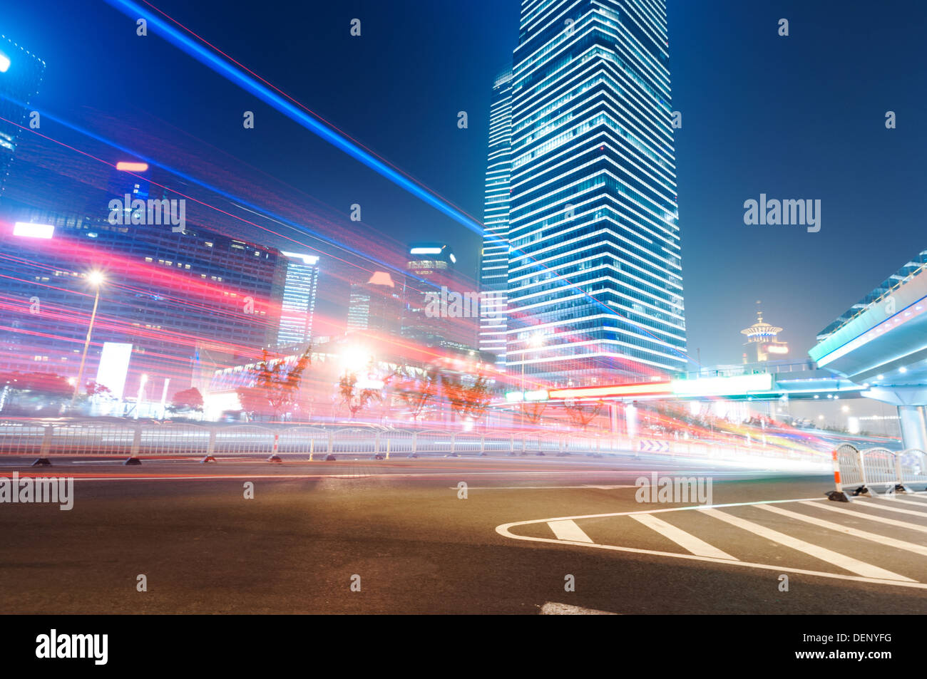 the light trails on the modern building background in shanghai china ...