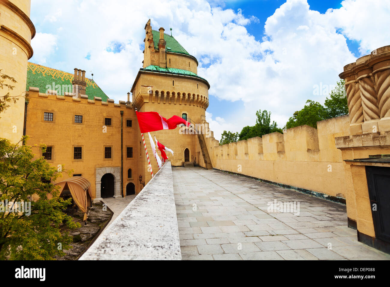 Bojnice castle in Slovakia walls with the flags and the tower Stock ...